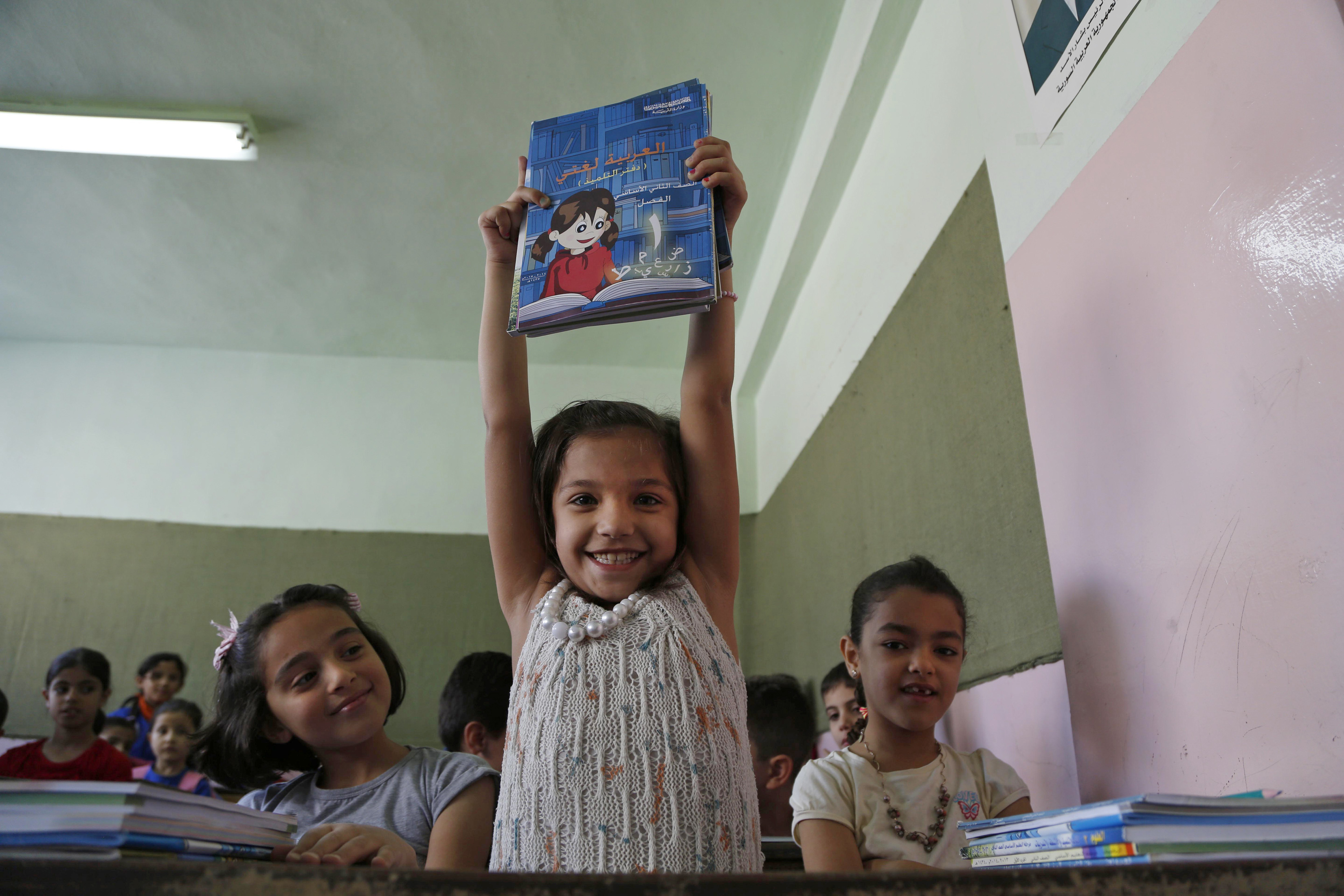 A Commitment to Raise the Global Ambition for Girls’ Education | Brookings